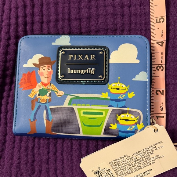 Loungefly | Accessories | Loungefly Pixar Blue And Green Kids Wallet ...